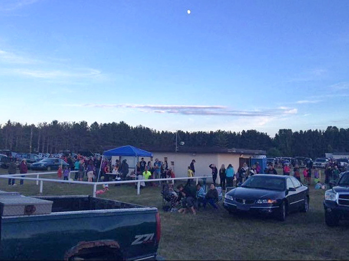 The concession area buzzes with pre-show energy as moviegoers stretch legs and stock up on classic cinema treats.