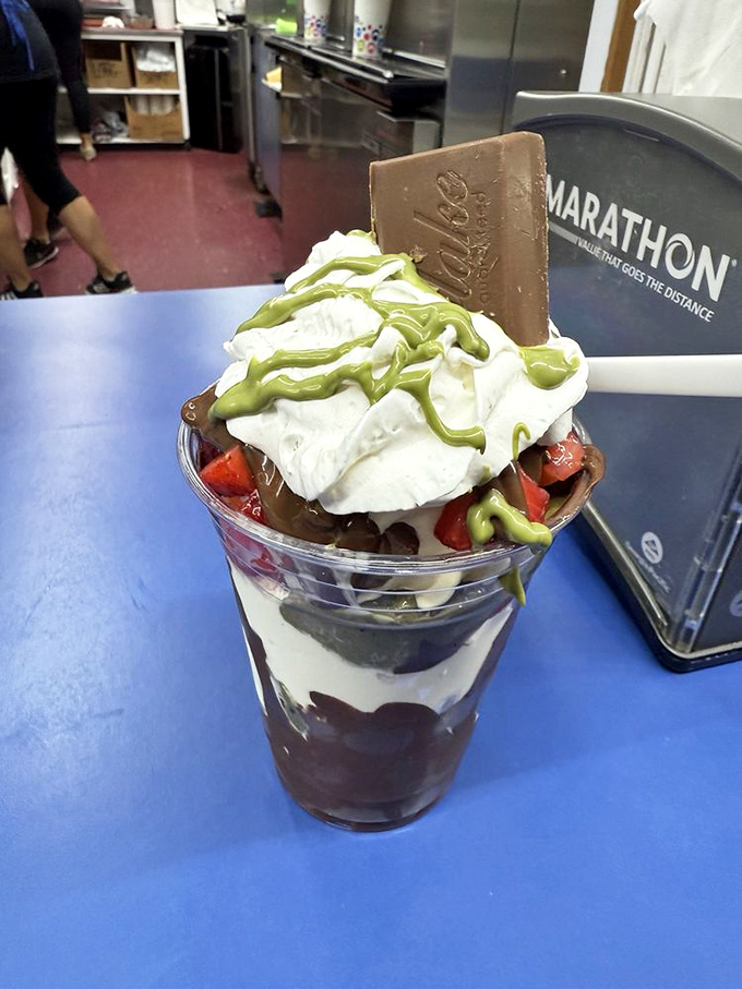 Dubai Chocolate sundae brings international flair to Michigan, with rich chocolate custard adorned with a chocolate bar for double the indulgence.