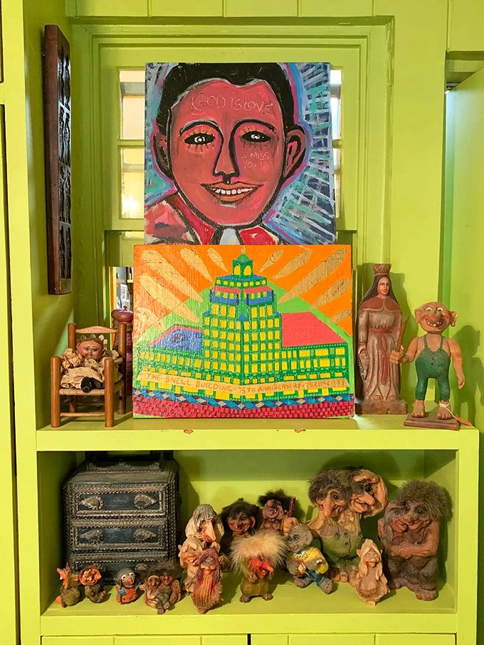 This eclectic collection of figurines and folk art proves that in this house, even the shelves refuse to be ordinary.
