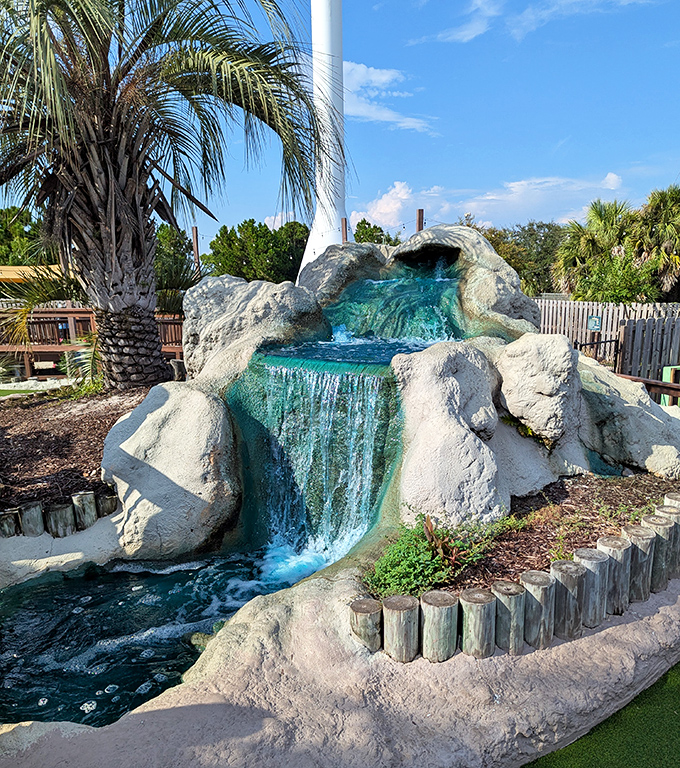 Crystal blue waters cascade down carefully crafted rocks, offering a moment of tranquility amid the high-energy adventures.