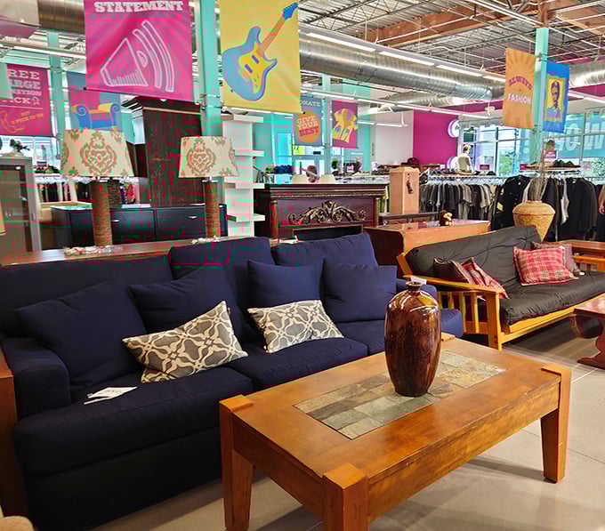 That navy sofa has seen things, darling &ndash; and now it's ready to see your living room at a fraction of retail price.