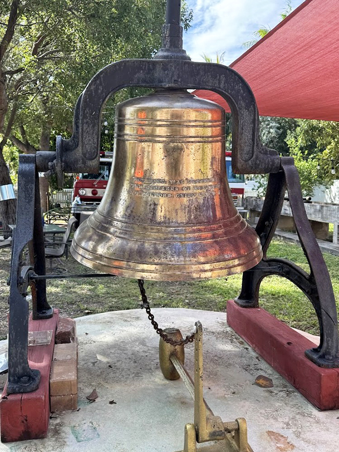 The historic bell once called brave souls to action, its resonant tone cutting through Key West's tropical air like a brass knife.