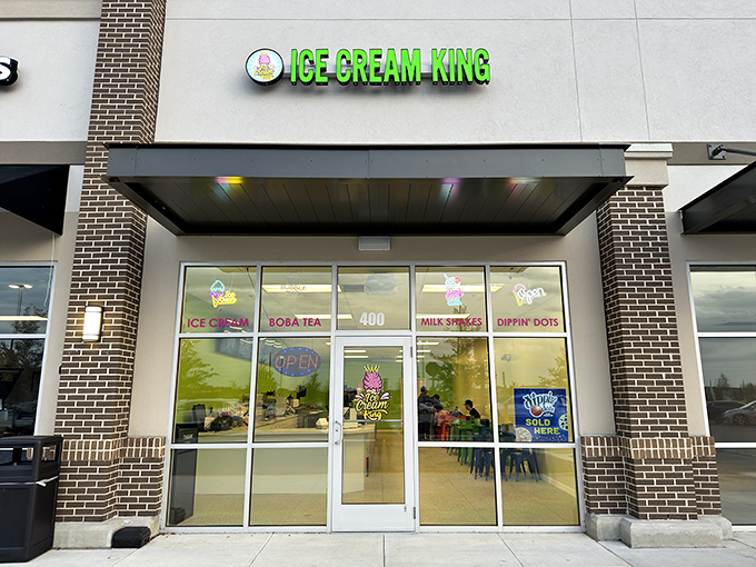 Ice Cream King's cheerful storefront promises sweet relief from Florida heat &ndash; a rainbow of frozen treats awaits inside.