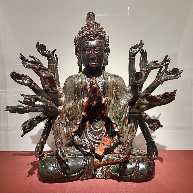 Multi-armed and infinitely patient, this Buddhist deity looks like it's ready to multitask better than any modern parent.
