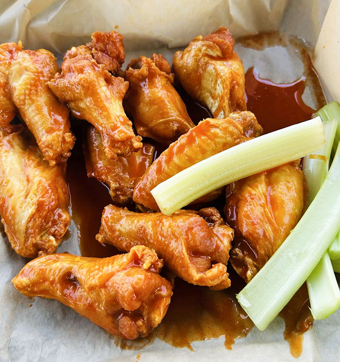 These buffalo wings aren't playing around &ndash; meaty, crispy, and sauced to perfection, they're what all other wings aspire to be.