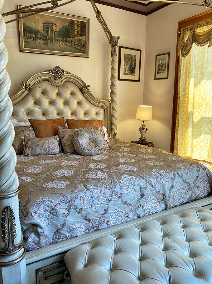 Luxurious Repose: Plush bedding and elegant furnishings create a bedroom fit for royalty, where modern comfort meets Victorian splendor.