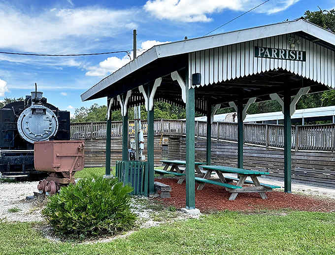 Parrish train depot: The charming green-roofed Parrish station stands ready to welcome travelers, its vintage styling a portal to railroading's golden age.