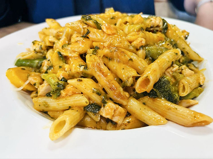 Pasta gets the Caribbean treatment with fresh vegetables and chicken in a sauce that proves Italian-Caribbean fusion is the crossover we didn't know we needed.