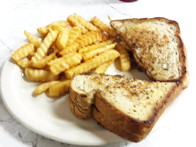 The humble patty melt &ndash; where a juicy beef patty meets sweet grilled onions and melted cheese on toasty bread. Simple perfection on a plate.