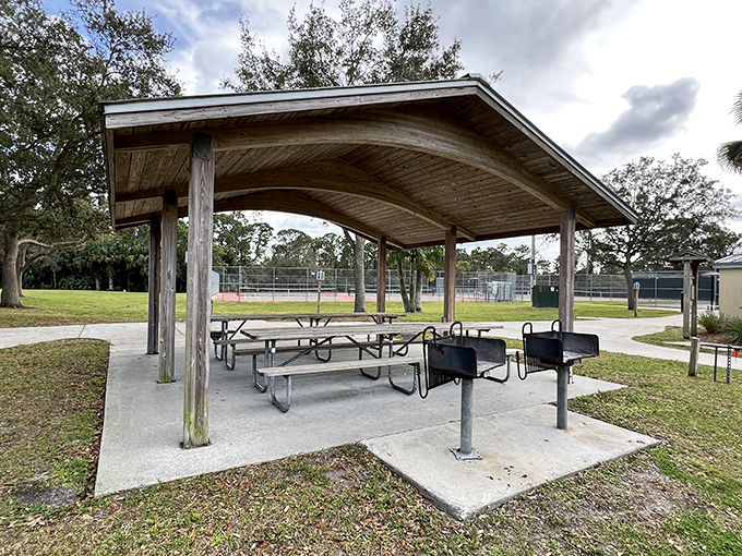 The picnic pavilion: where sandwiches taste better, conversations flow easier, and nobody judges your questionable sunhat choices.