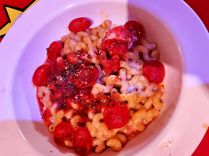 The culinary equivalent of a circus performer who can't decide on one talent &ndash; mac and cheese meets pizza in a delicious identity crisis.