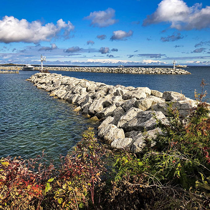 Nature's rock collection creates a rugged barrier where lake meets land, sculpted by centuries of waves having their way with the shoreline.