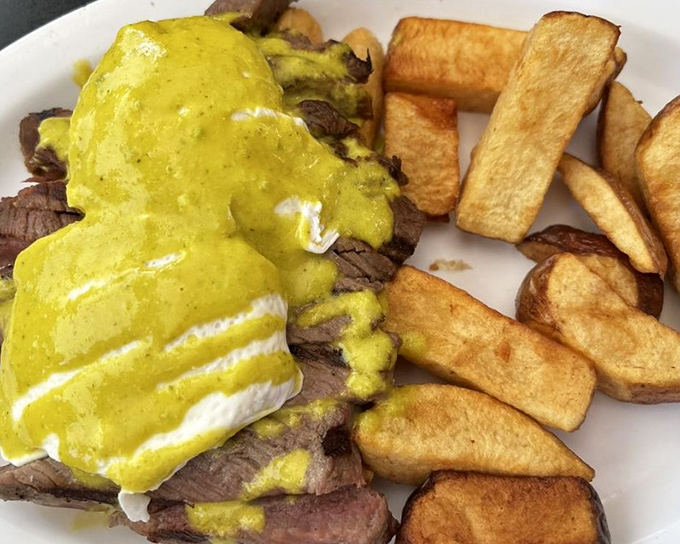 Steak and eggs get the royal treatment with a vibrant hollandaise that's practically glowing with lemony goodness.