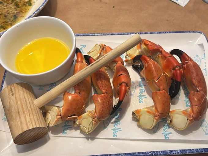 Stone crab clusters arranged like nature's jewelry box, each claw a treasure chest of sweet, briny meat waiting to be discovered and devoured.