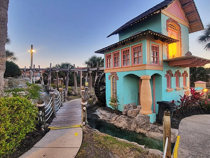 Sunset Watermill House: This charming turquoise structure could be plucked from a storybook &ndash; its whimsical design and warm lighting create postcard-perfect moments at dusk.