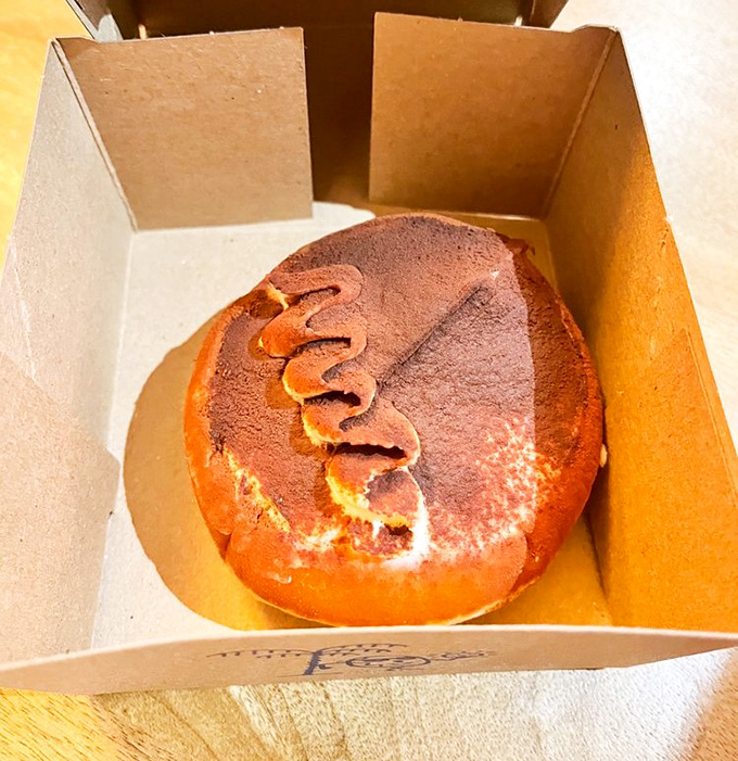 Tiramisu Donut: Coffee-soaked dreams dusted with cocoa &ndash; Italy's favorite dessert reimagined in hand-held form for maximum portable pleasure.
