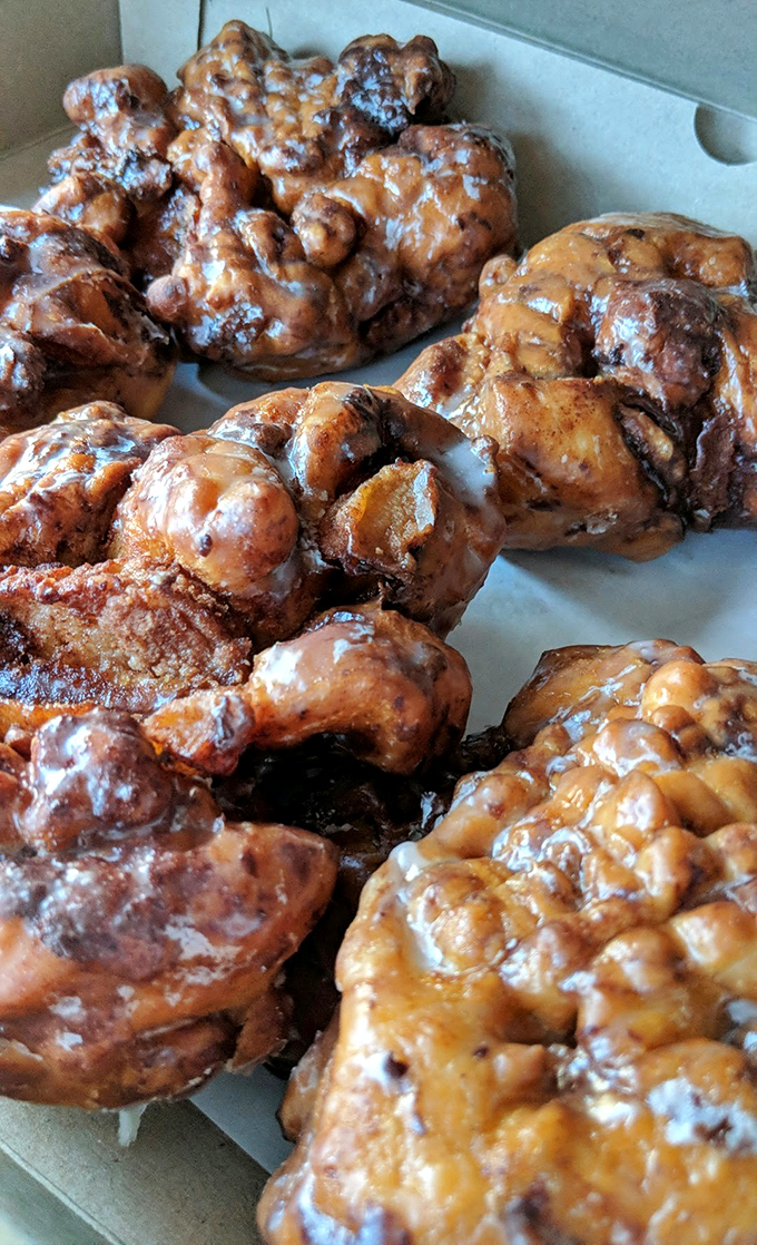 The morning lineup of golden-brown beauties, each one unique like a sugary snowflake.