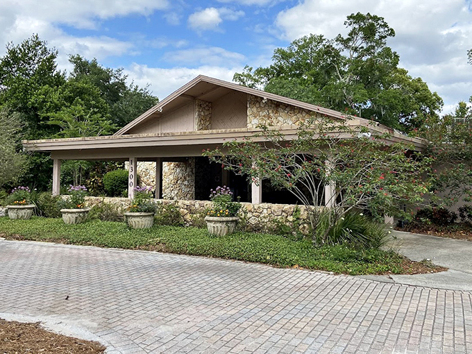 Stone and timber blend harmoniously in this visitor center, looking like it grew organically from the garden itself.