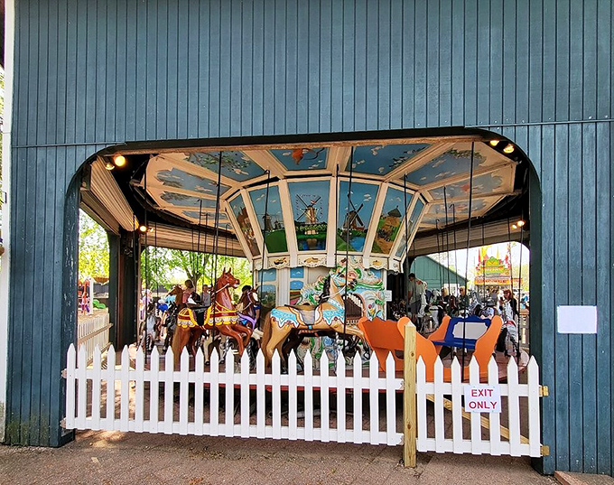 Carousel ride: The antique Dutch carousel spins with hand-painted scenes of the Netherlands, delighting riders of all ages.