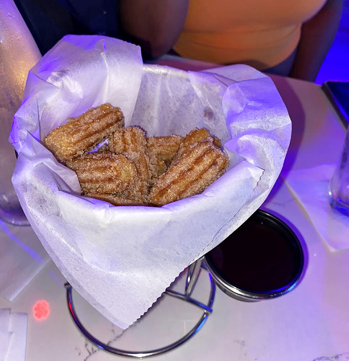 Warm, cinnamon-sugar dusted churros create a delicious steam cloud in the icy air &ndash; nature's most delicious hand warmers.