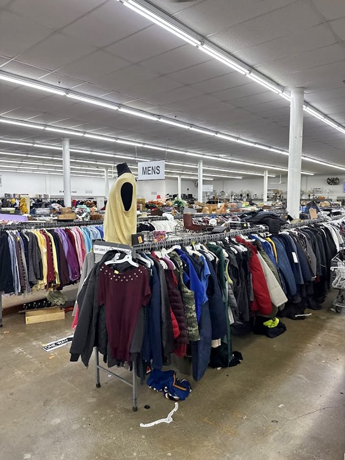 The men's section stands like an army of headless businessmen, suits from every decade patiently waiting for their next career opportunity.