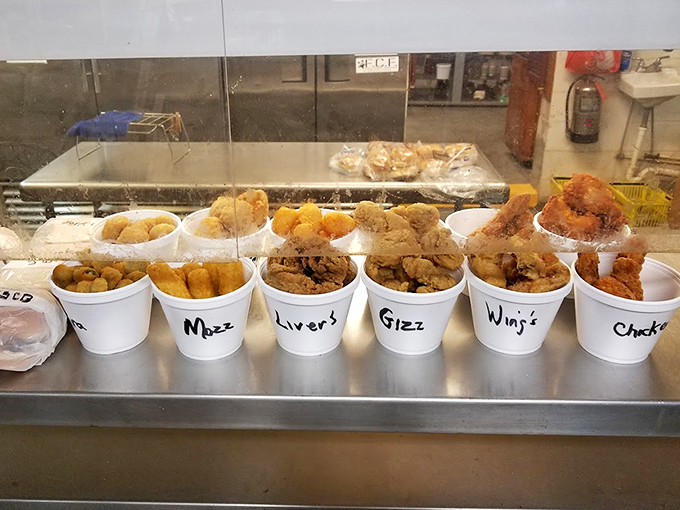 Country cooking at its finest &ndash; these crispy fried delights labeled in charming handwritten cups represent authentic Southern food traditions.