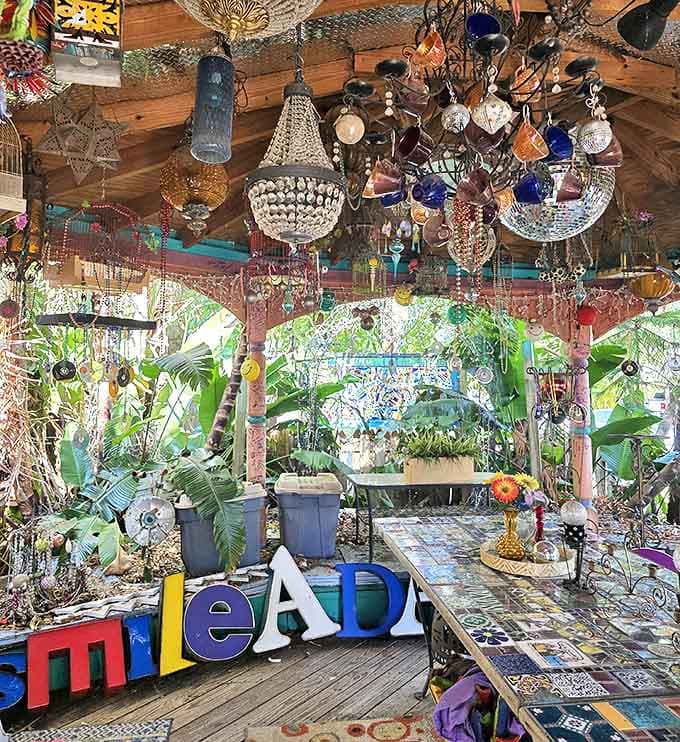 The gazebo transforms ordinary outdoor seating into a whimsical wonderland, where chandeliers dangle like jewelry for the garden.