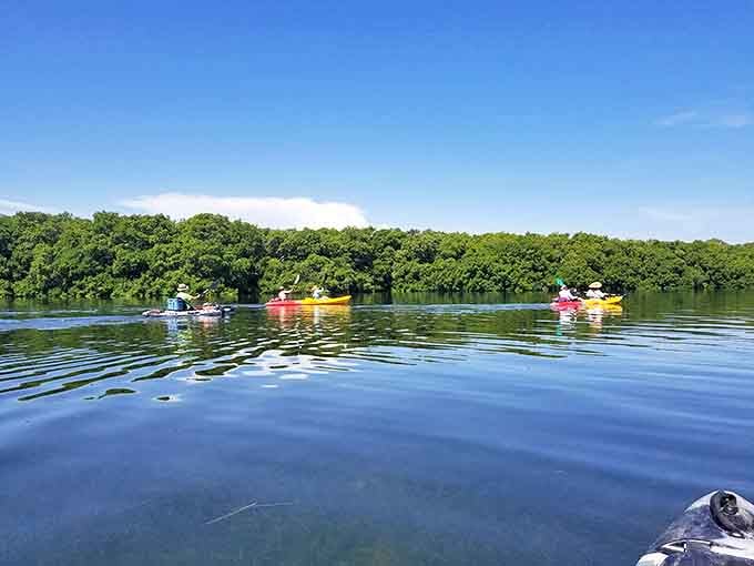 Kayaking these crystal-clear waters beats sitting in traffic contemplating your life choices, which is what you'd probably be doing otherwise.