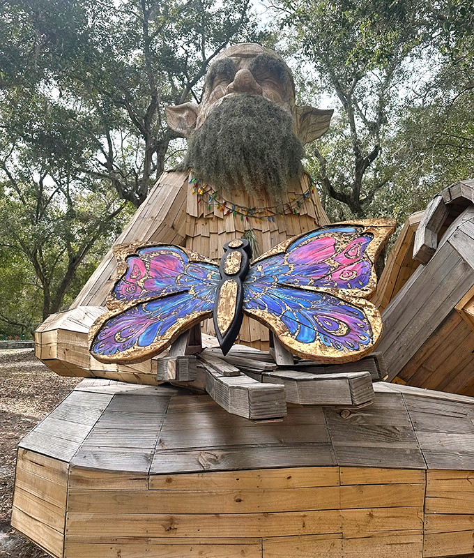 Gnomeo stands sentinel over his woodland domain, his wooden beard flowing majestically as butterflies consider it a potential landing spot.