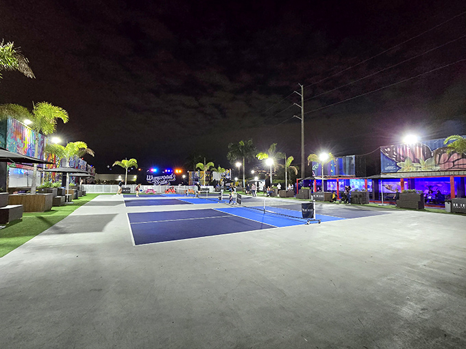 Night falls but the fun's just warming up at these illuminated pickleball courts, where friendly competition continues under Miami's starlit sky.