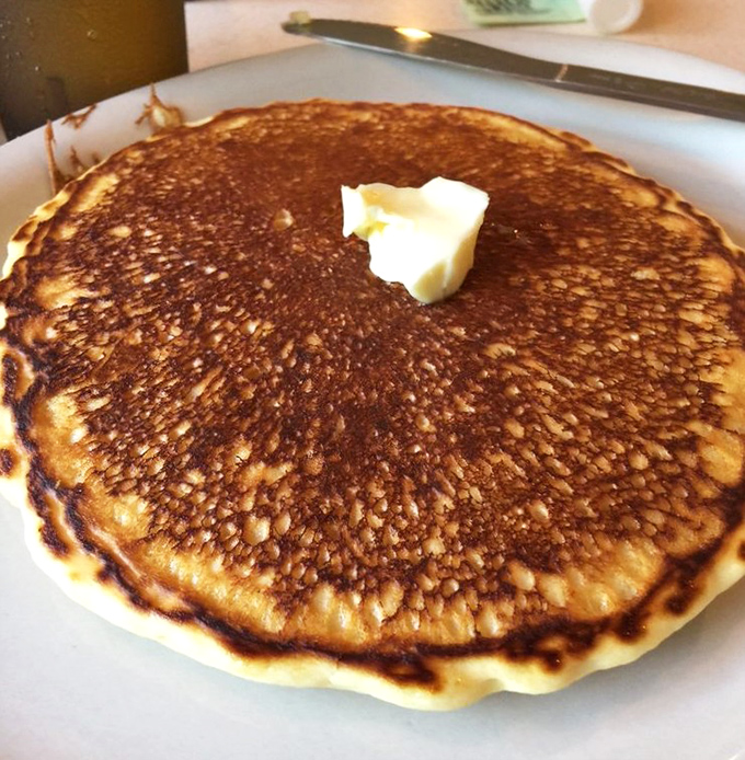 The perfect pancake doesn't exi&mdash; wait, there it is! Golden-brown, plate-sized, and ready for its maple syrup baptism.