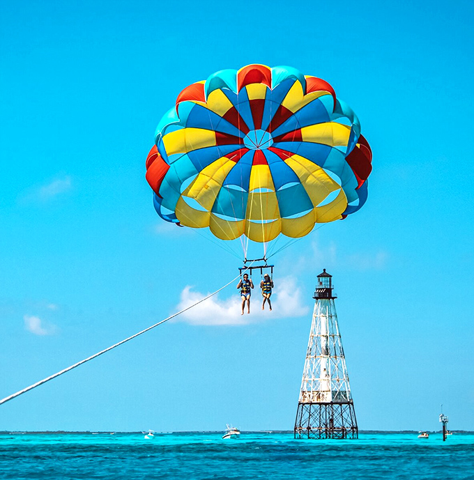 Soar above the patchwork of blues and greens that make the Florida Keys a paradise, with parasailing adventures launching right from Robbie's dock.