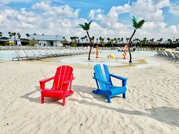 Colorful chairs invite sun-worshippers to plant themselves firmly between sand and sky for maximum vitamin D absorption.