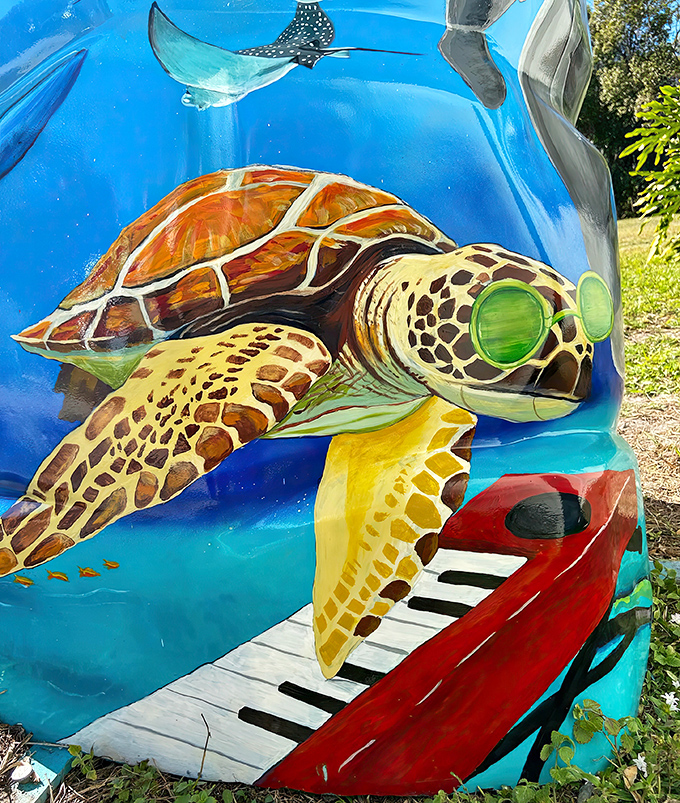 Up close, the intricate details reveal hours of painstaking work, because apparently some artists enjoy painting tiny scales more than their sanity.