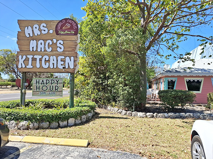 Mrs. Mac's Kitchen's cheerful pink exterior stands out like a beacon for hungry travelers seeking authentic Keys flavors and homemade key lime pie.