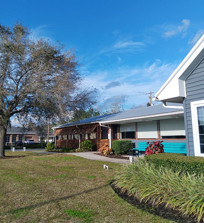 Schooner's simple white building with blue trim reflects the straightforward approach inside: fresh seafood without pretense or tourist markup.