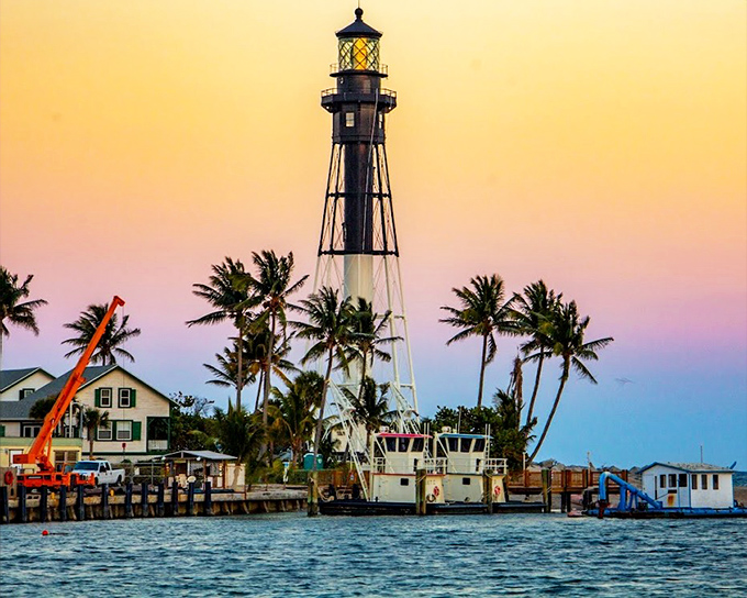 The bold spiral pattern of Hillsboro Lighthouse creates an eye-catching silhouette, its unique design immediately recognizable to sailors and lighthouse enthusiasts alike.
