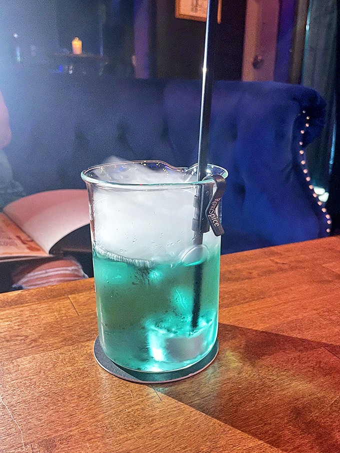The "Abyss" cocktail lives up to its name &ndash; this glowing turquoise concoction seems to contain secrets from the ocean's deepest trenches.