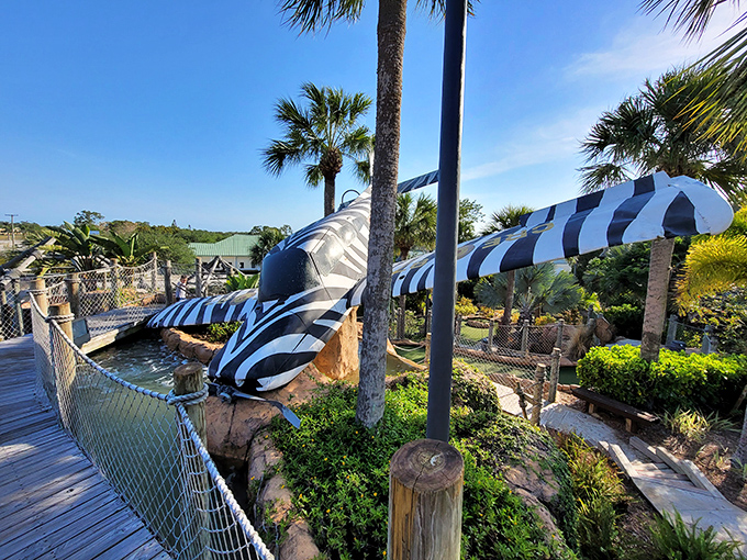 This zebra-striped aircraft seems to have made an emergency landing, creating perhaps the most unique hazard in mini-golf history.