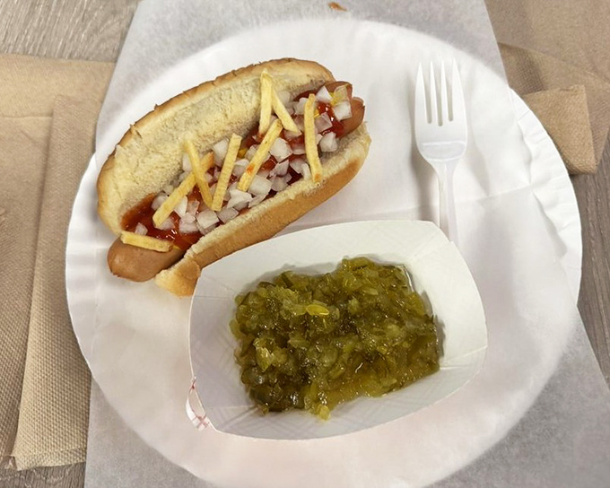 The "All Around" dog proves that sometimes more is more &ndash; a flavor party where mustard, relish, and onions dance in perfect harmony.