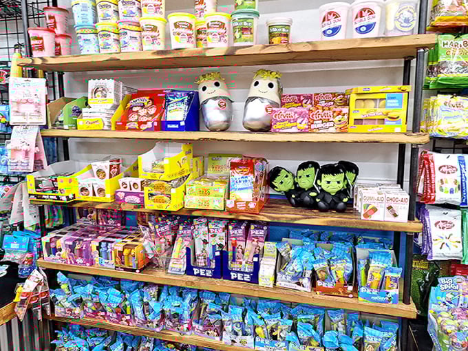 Plain wooden shelves transform into a vibrant candy display, overflowing with treats in every color and shape.