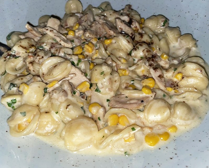 Pasta that doesn't swim with the fishes, but alongside them&mdash;orecchiette with chicken and corn in a sauce worth diving into.