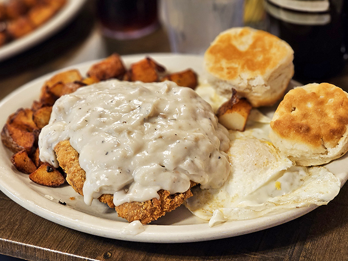 A country-fried masterpiece swimming in gravy so good you'll be tempted to ask for a straw. Comfort food that hugs your insides.