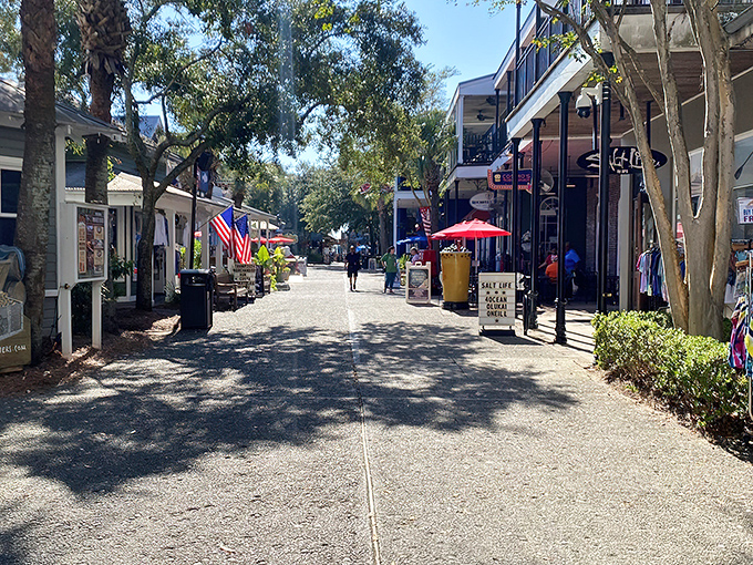 Shaded walkways lined with shops invite leisurely strolling, where "just browsing" inevitably turns into "I need this beach-themed everything."
