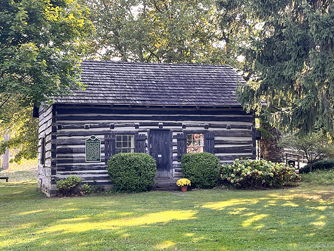 Comstock Cabin offers a rustic counterpoint to the castle's fantasy, showing Michigan life before fairy tales could be built in stone.