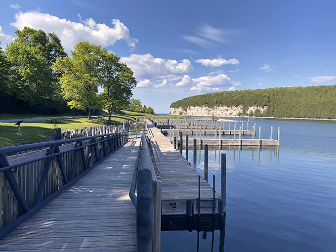 This wooden dock extends like a welcome handshake from the present to the past, inviting exploration.