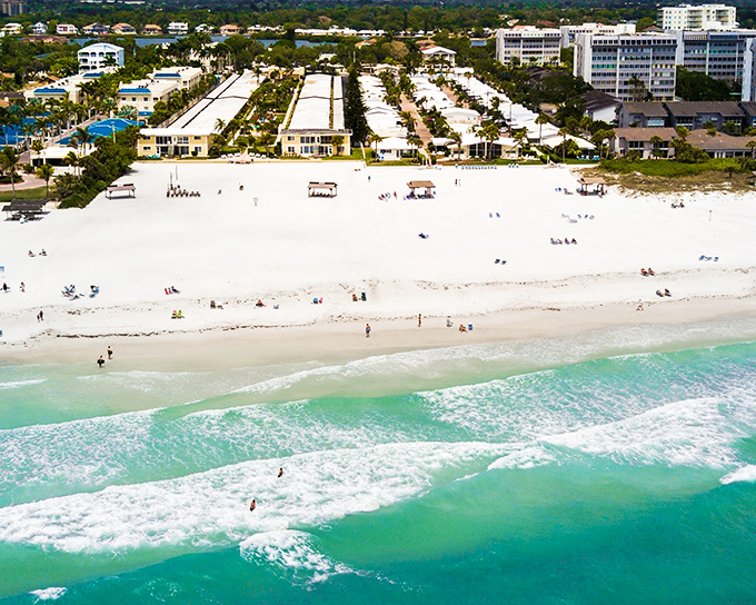 A bird's-eye perspective reveals the perfect harmony between developed spaces and natural beauty that makes Siesta Key so special.