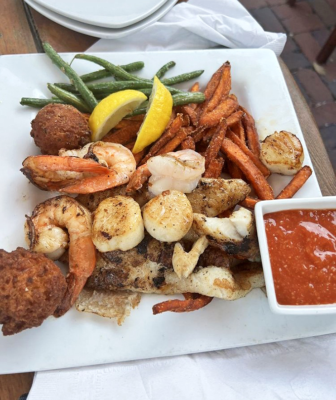 Fresh seafood platter featuring plump shrimp and tender scallops – Florida's coastal bounty delivered straight to your table with love.