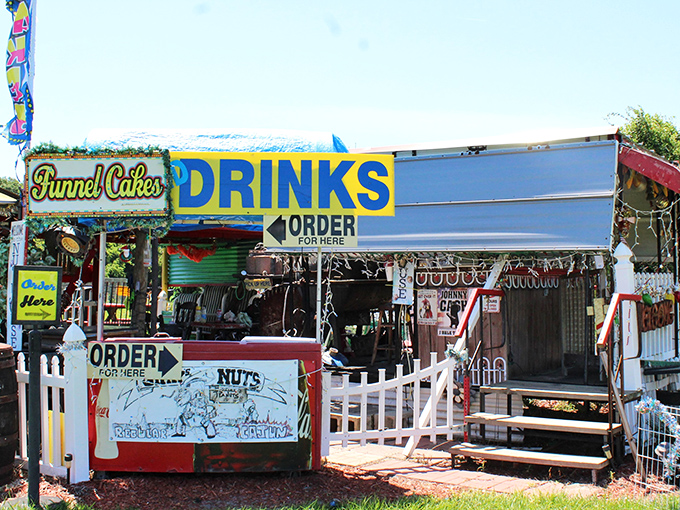 This charming food stand promises the kind of simple pleasures that taste better outdoors – funnel cakes and cold drinks that complement the day's adventures.