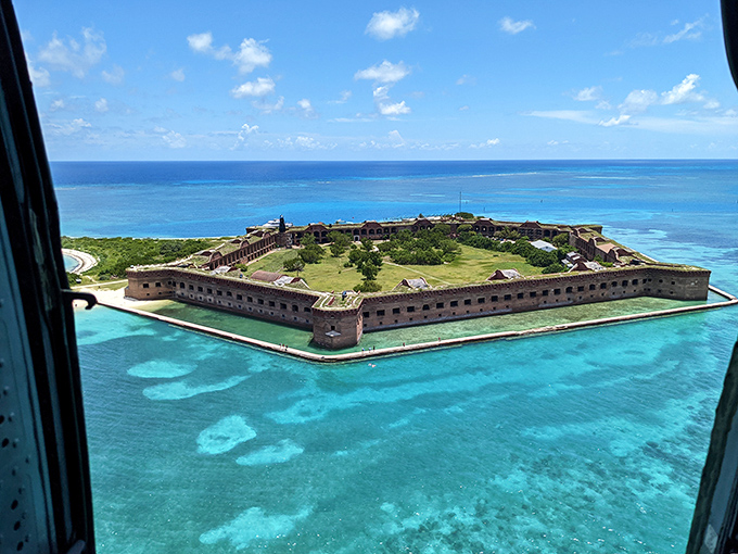 Fort Jefferson from above reveals its perfect hexagonal design &ndash; military precision surrounded by nature's wild beauty.